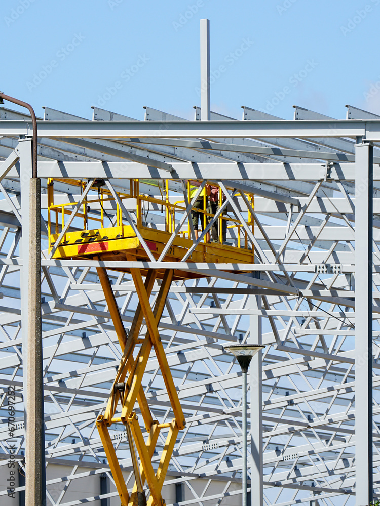 Complex large volume steel frame structure assembly using self ...