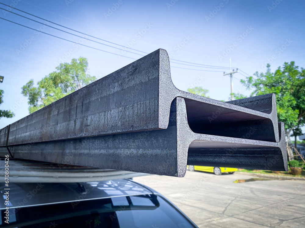 Steel I-beams production. Metal girders stack on project construction ...