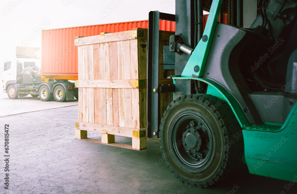 Forklift Tractor Unloading Wooden Crate at Warehouse. Trucks Loading ...