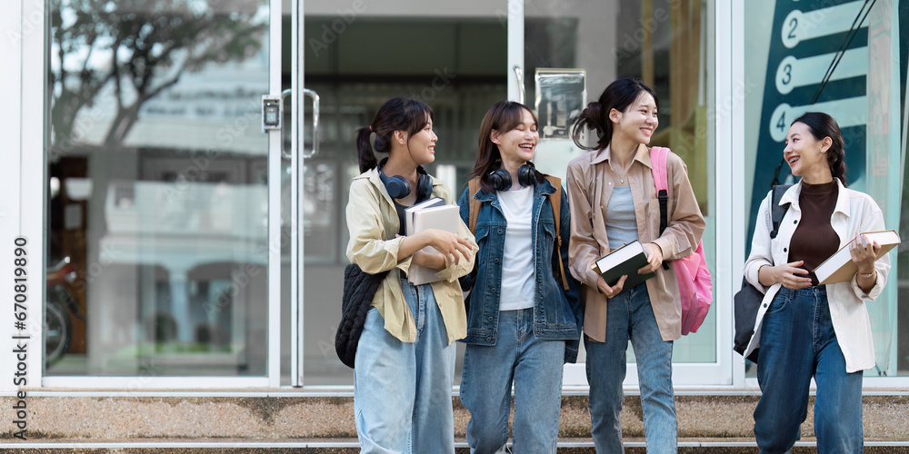 Group of Young Asian student walking and talking at university before ...