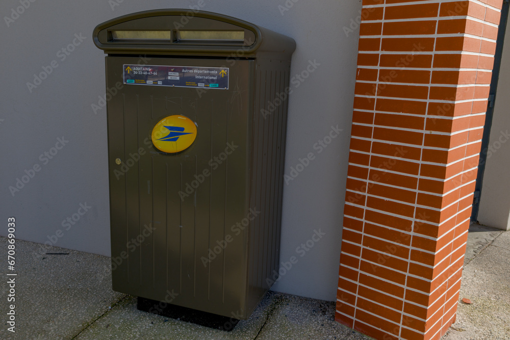 La Poste logo text and brand sign on brown post box street french ...