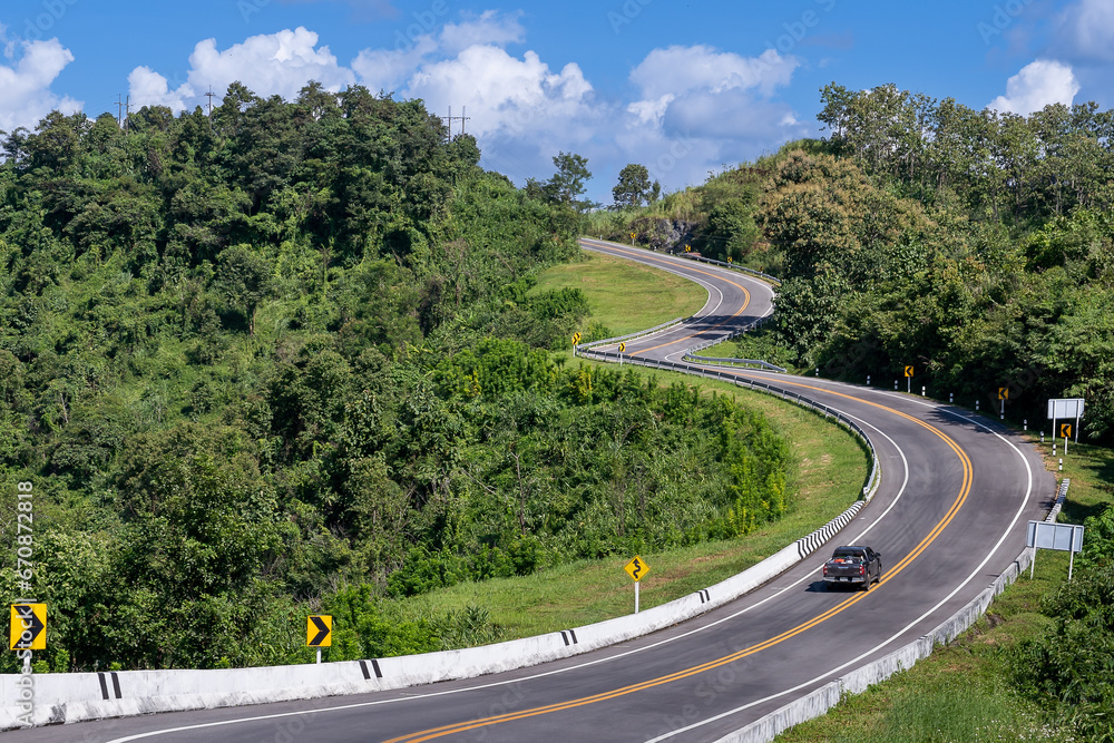 The road is similar to the number 3, This road is built on a mountain ...