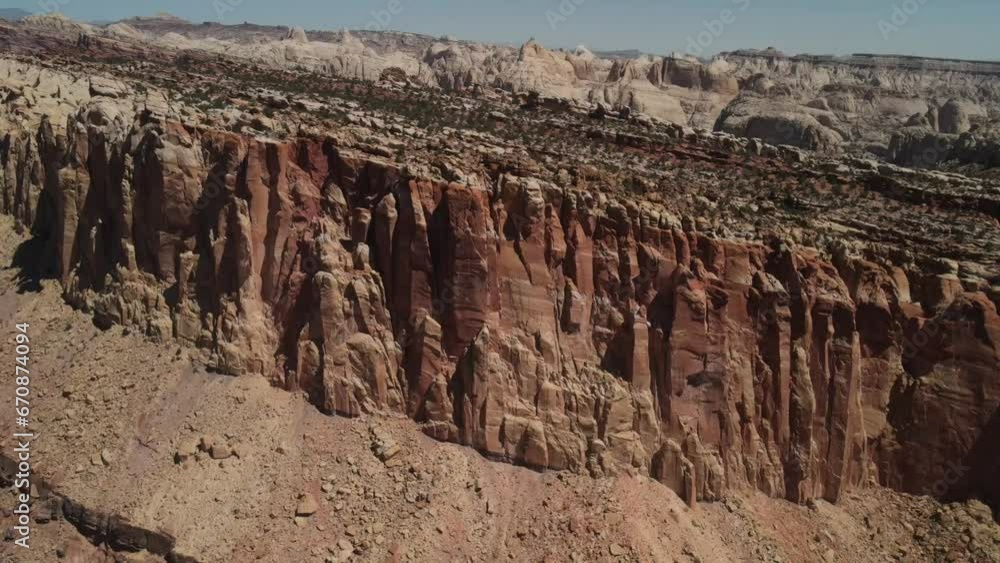 An intimate examination of drone footage of a stone wall formation ...