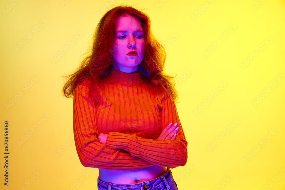 Offended face. Young girl standing with unhappy, unpleasant face ...