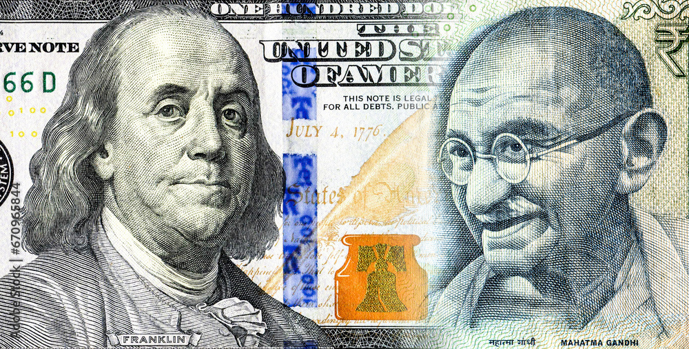 Portraits of Benjamin Franklin on banknote american dollars and Mahatma ...