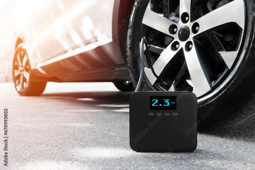 Air compressor. Car portable pump auto air compressor isolated. Car ...