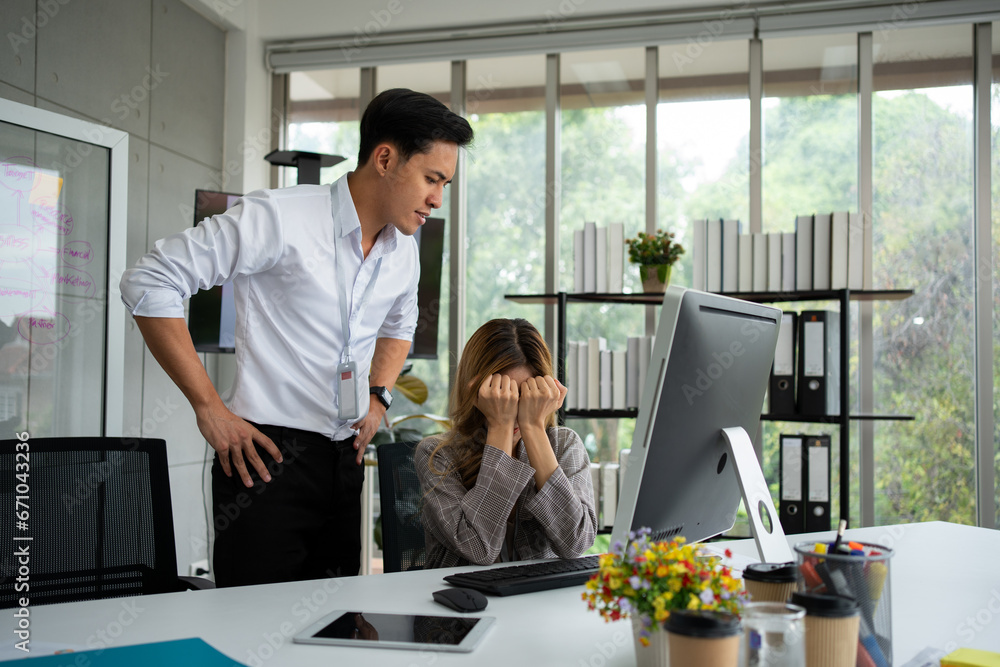 Stressed of female employee and offensive faces that the boss yells ...