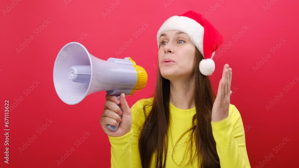 Cheerful young woman wear sweater and Santa Claus hat scream in ...