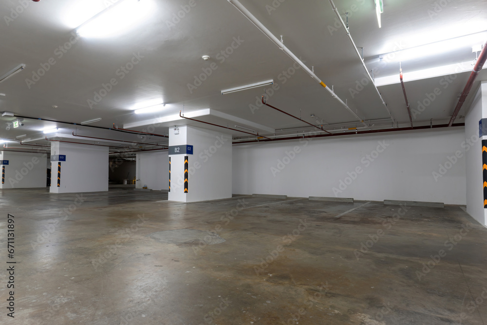 Empty car park with blank wall. space parking garage building and space ...