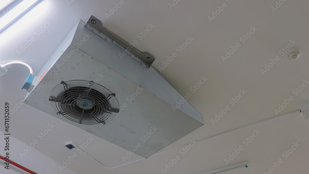 Fan in modern building Parking in door. Parking building ventilation ...
