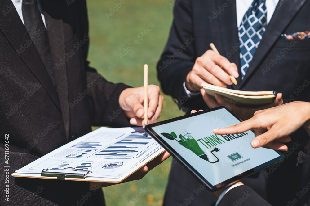 Group of asian business people presenting environmentally friendly ...