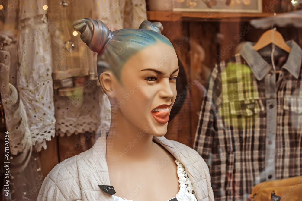 Fancy clothing in a store in European shops. Display of a clothing ...