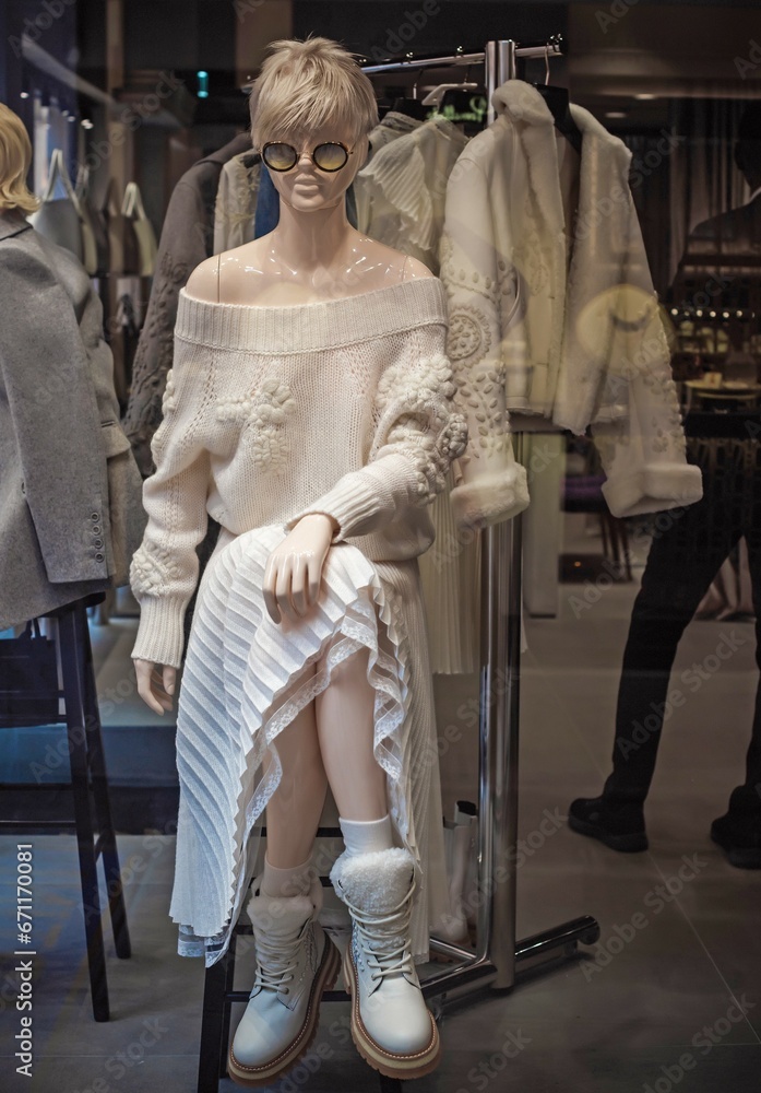 Fancy clothing in a store in European shops. Display of a clothing ...