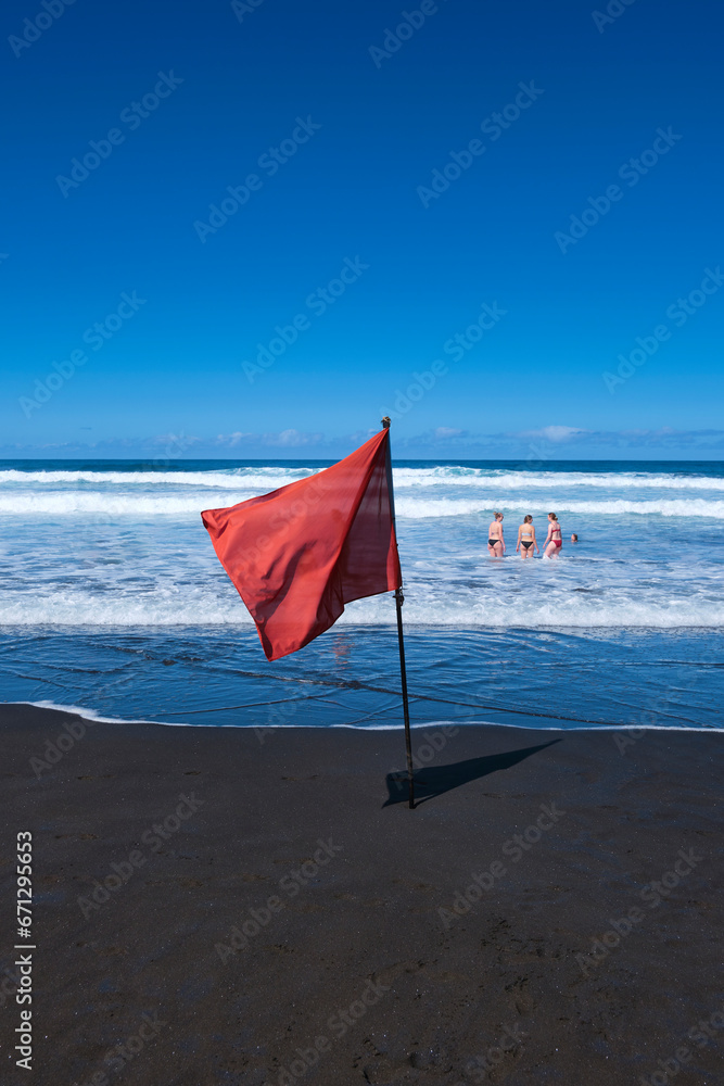 Red Flag Sign at the Beach, Signifying No Swimming Due to Strong Waves ...