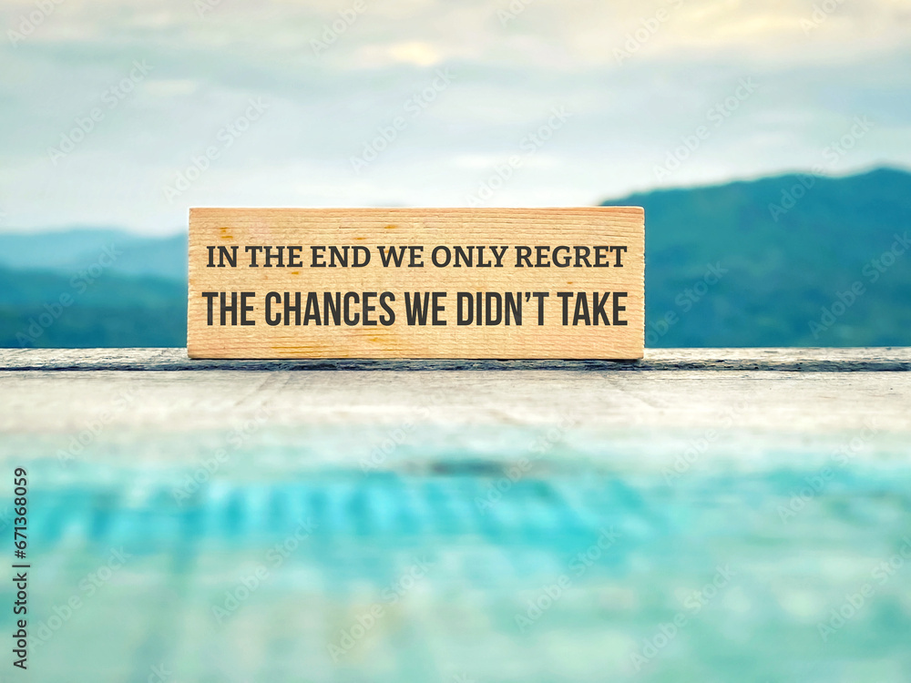 Inspirational motivational quote concept background - In the end we only regret the chances we ...