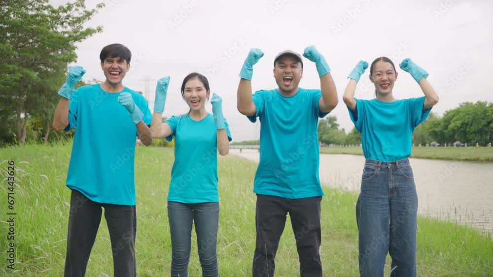 Volunteering, charity and clean environment concept. Happy asian ...