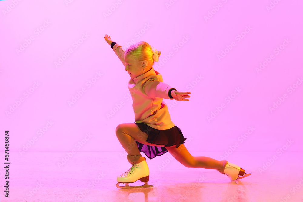 Little artistic, talented, adorable girl, child training figure skating ...