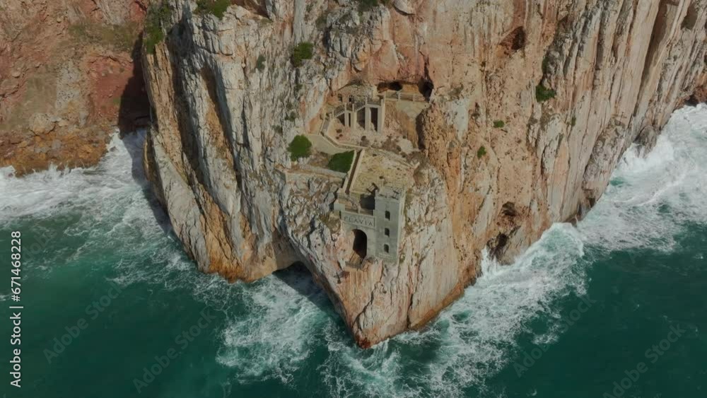 Orbital aerial view of the historic mining port of Porto Flavia in the ...