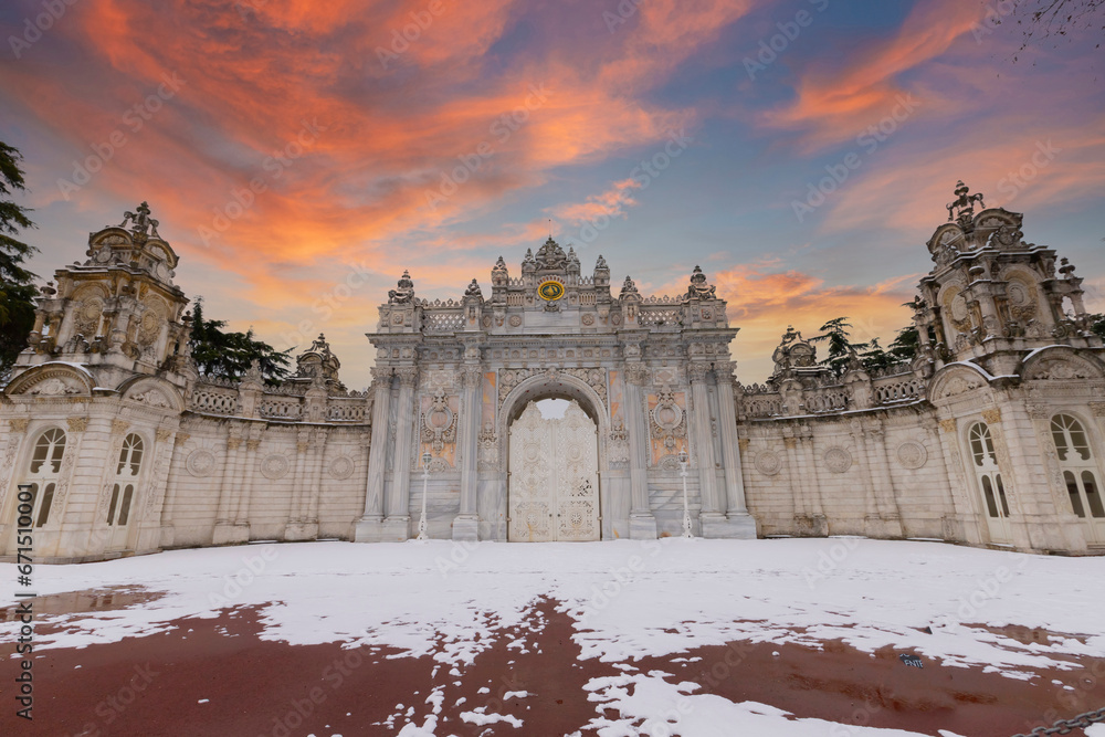 Sunset shot of closed gate leading former Ottoman Dolmabahce Palace ...