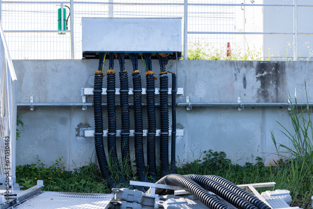 The main power cable installed with flexible cable conduit to Floating ...