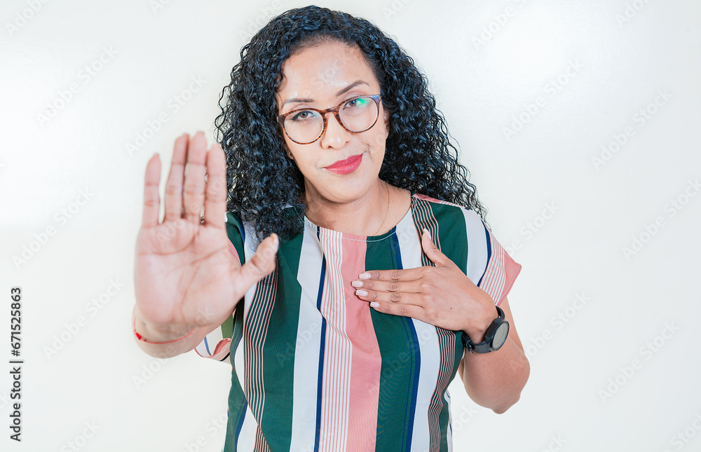 Afro girl gesturing stop isolated. Latin girl gesturing stop with palm ...
