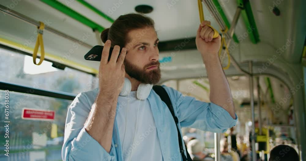 Vidéo Stock Male traveler riding in public transport standing inside ...