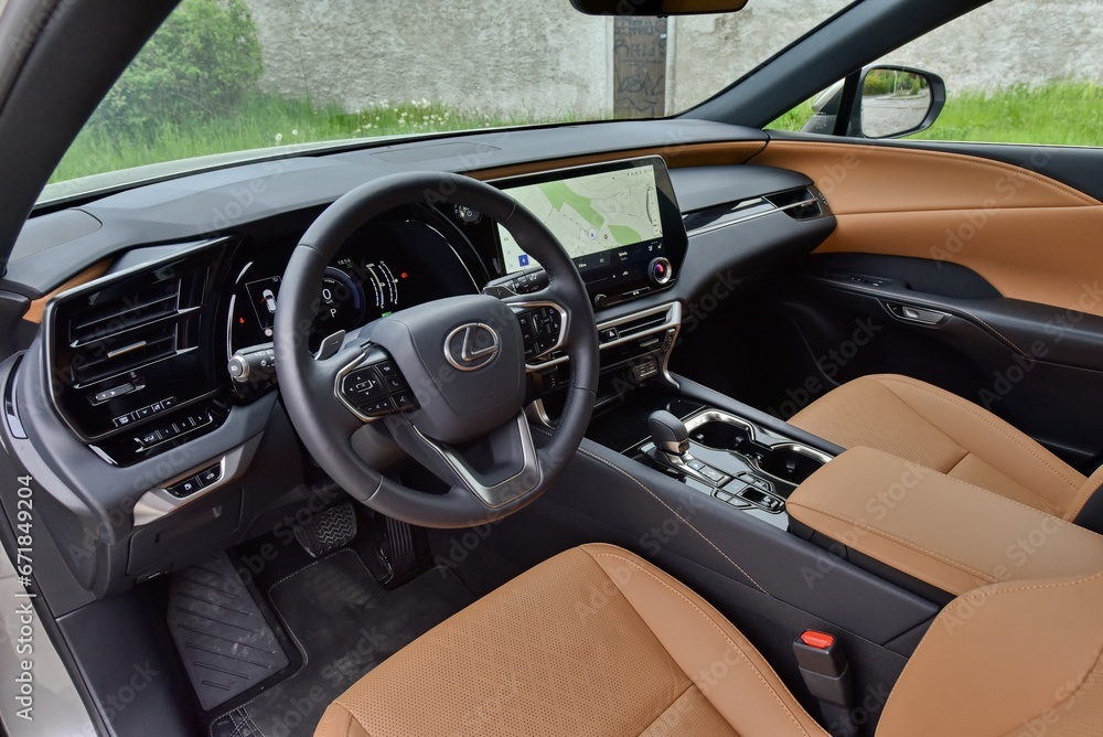 Lexus RX 450h+. A luxury car with a plug-in hybrid drive. Cabin ...
