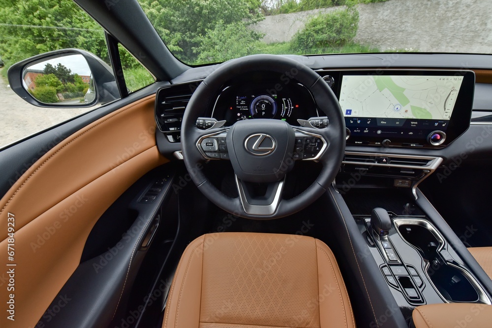 Lexus RX 450h+. A luxury car with a plug-in hybrid drive. Cabin ...