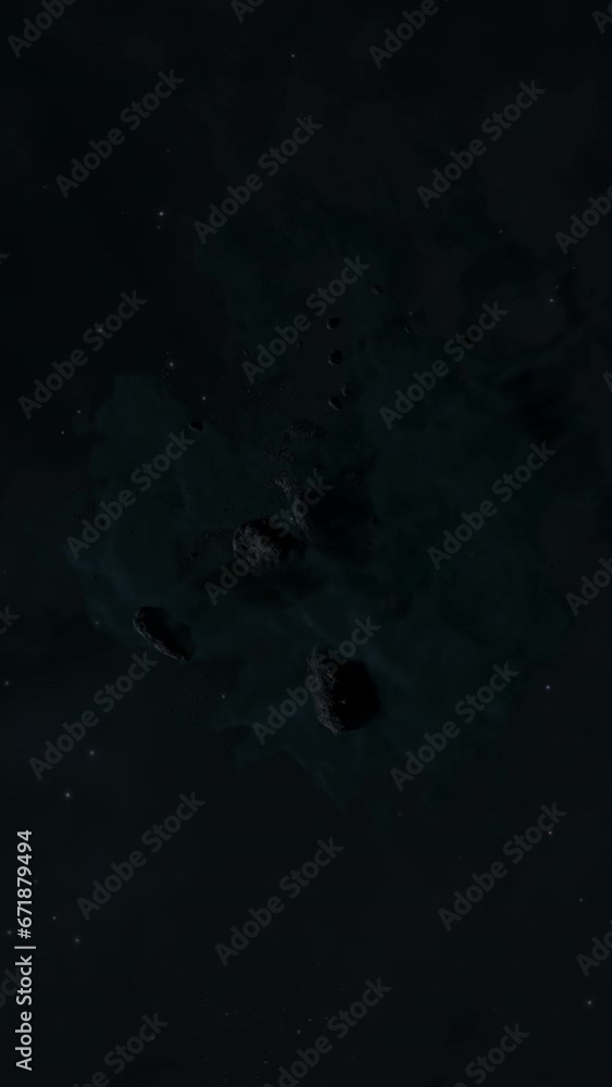 Asteroid belt field in dark outer space. 3D animation wide pan shot ...