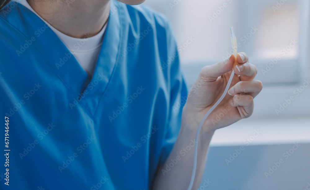 Injured patient showing doctor broken wrist and arm with bandage in ...