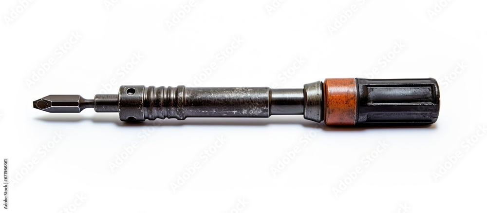 Ancient corroded screwdriver utilized with a dark plastic grip isolated ...