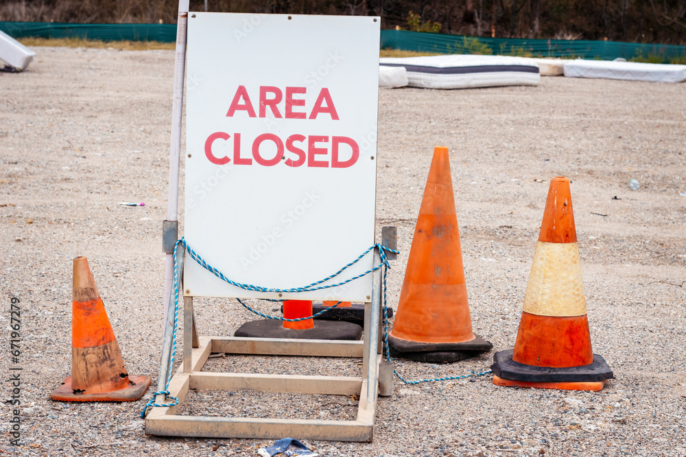 Traffic cones on road with area closed signage. Warning Sign. Stock ...