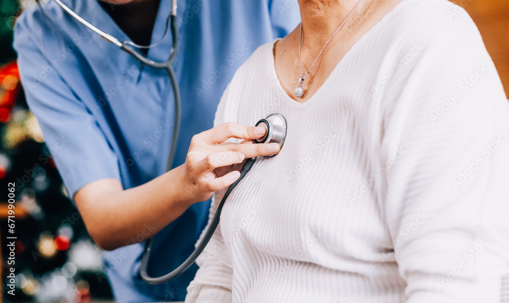Lady coming to clinic for heart and lungs checkup, male doctor using ...