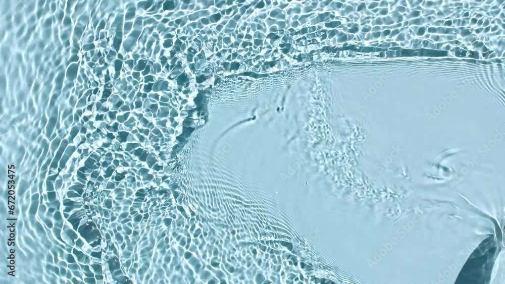 Pure water with reflections sunlight in slow motion. Water surface ...