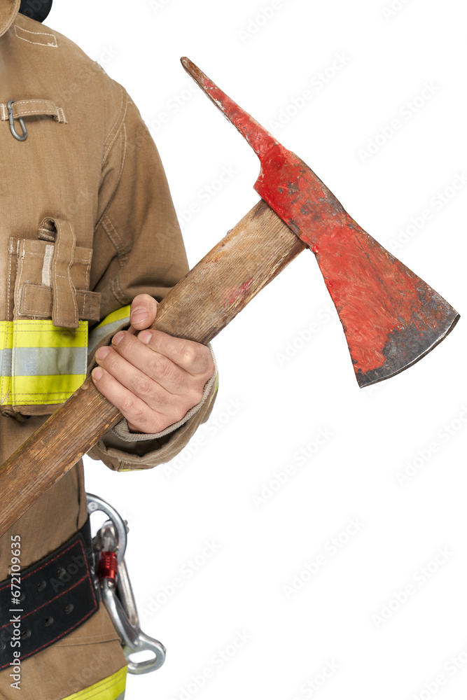 Crop view of anonymous male firefighter in uniform firmly holding red ...