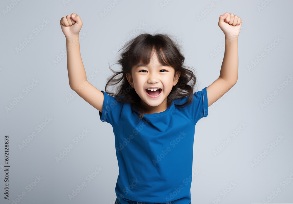 A 6-8 year old Asian girl, looking good and cheerful, stood with her ...