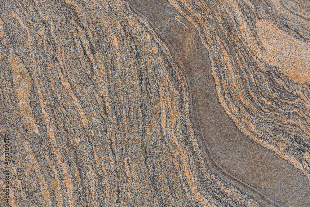 Wavy pattern from a brown granite stone. Background pattern natural ...