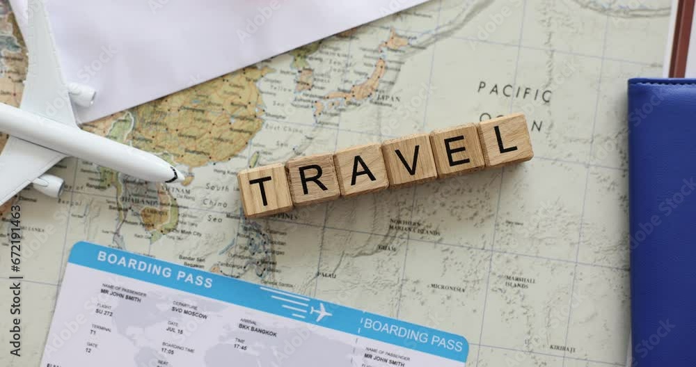 Aircraft and international passport on World Map in travel company ...