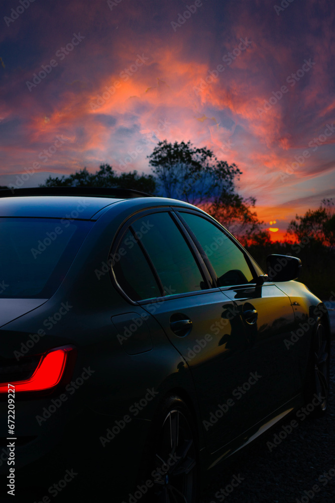 Side view of a BMW M340i, sunset sky, dark image - High Resolution ...