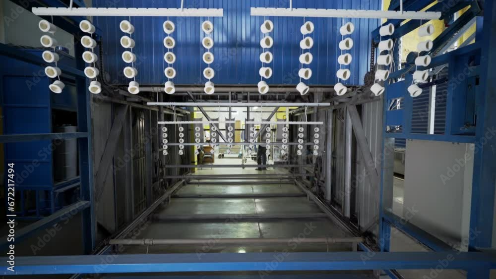 A Lot Of Light Sockets Hang In Large Drying Machine At Conveyor Line On ...