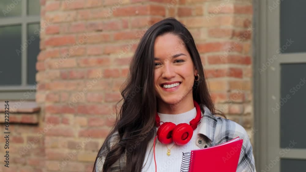 Close up individual portrait of a pretty hispanic female student ...