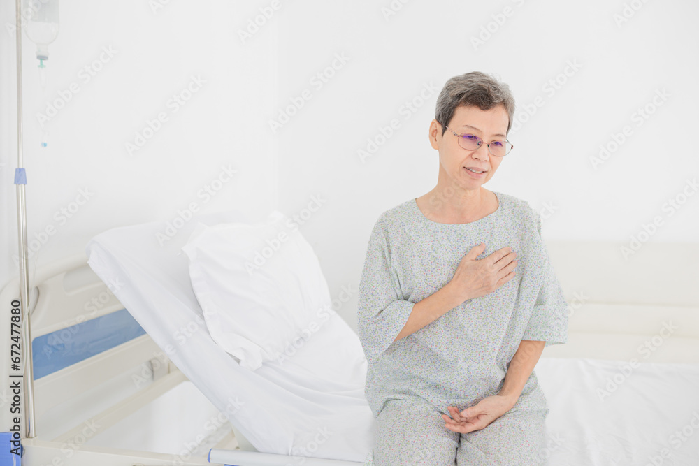 female patient feel tired in hospital, she use her hand touch on her ...