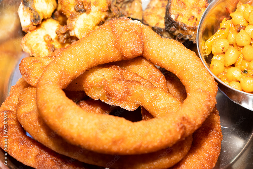 Sel Roti is a traditional Nepalese ring-shaped sweet fried dough made ...