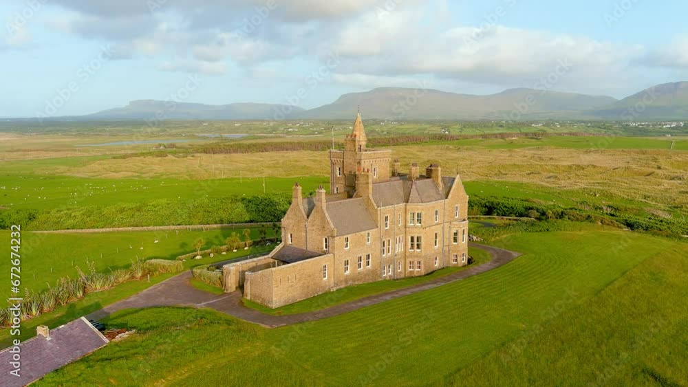 Spectacular aerial orbit sunset view of Mullaghmore Head with huge ... Spectacular aerial orbit sunset view of Mullaghmore Head with huge ...
