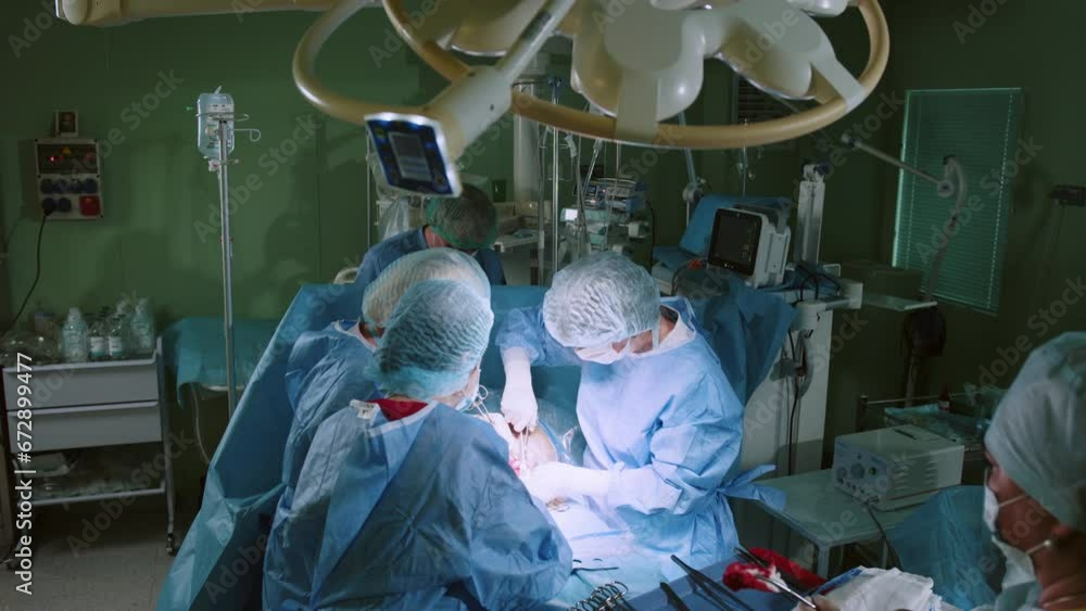 Vidéo Stock Doctor Performing Surgery Using Sterilized Equipment ...