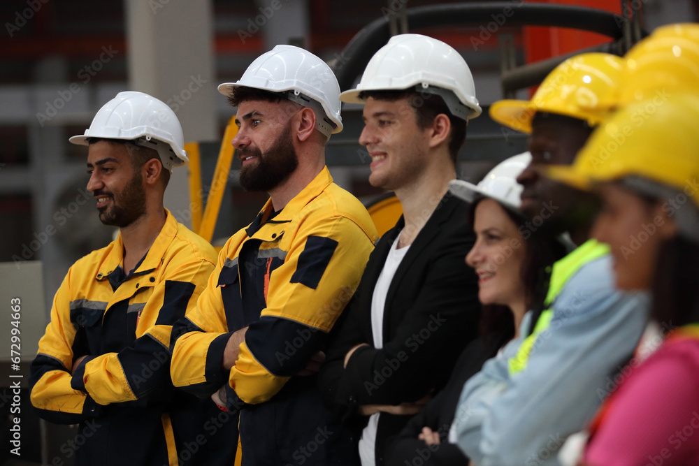 engineer team or worker team with safety uniform standing at industry ...