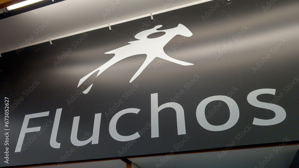 fluchos logo brand and text sign for shop chain store of fashion ...
