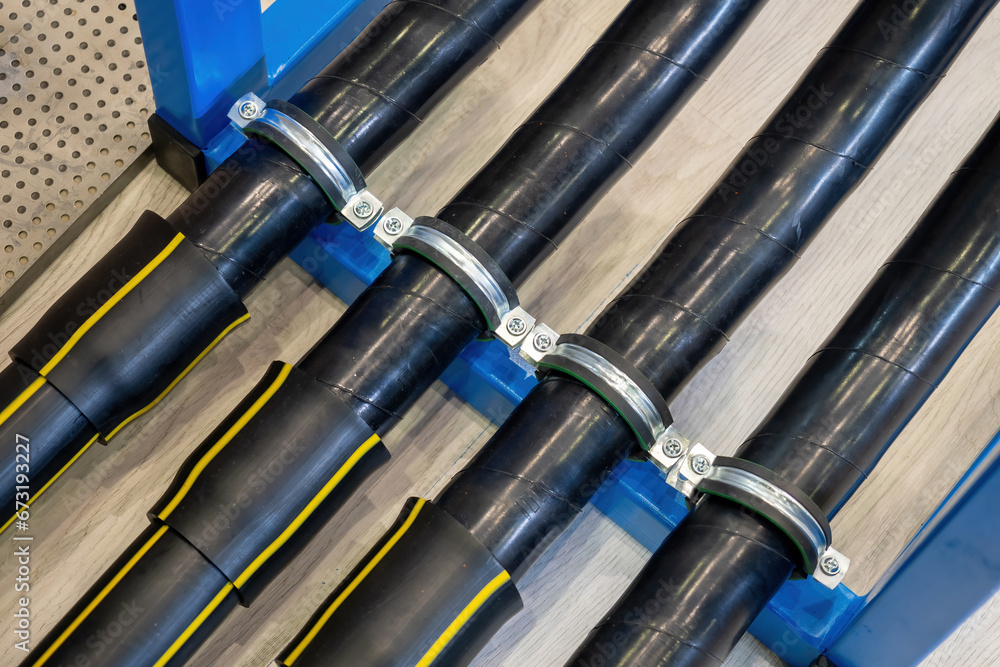 Polyethylene pipes. Pipeline with couplings. Pipes are attached to ...