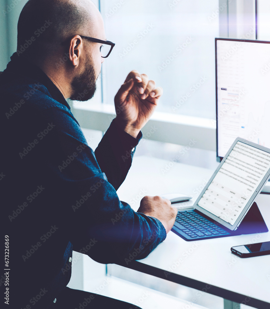 Businessman study financial market to calculate possible risks and ...