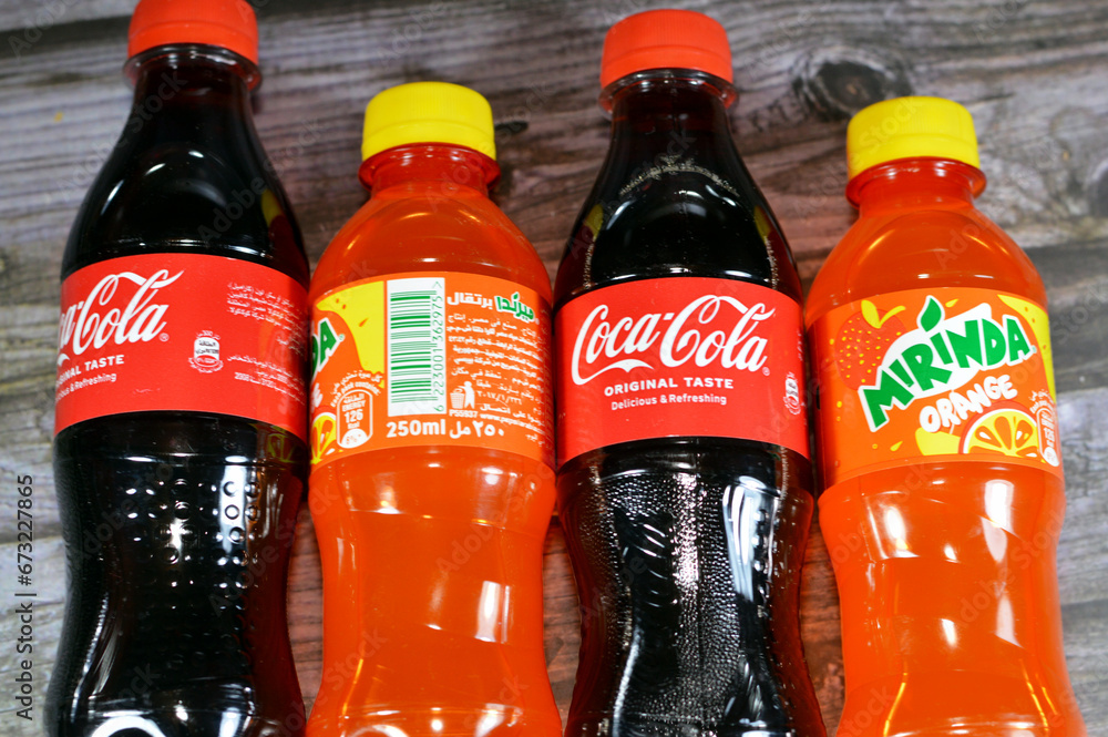 Cairo, Egypt, November 4 2023: Coca-Cola, or Coke and Mirinda plastic ...
